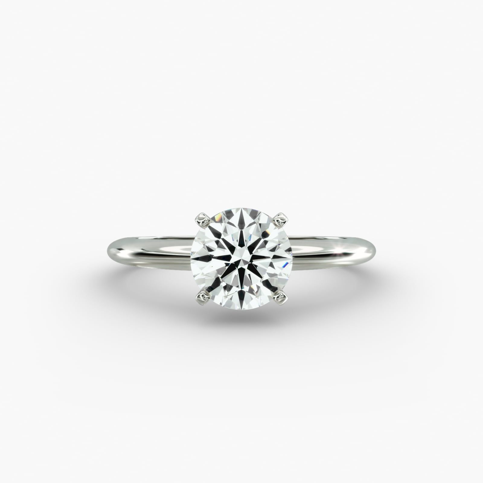 Classic Four Prong Solitaire Engagement Ring in Platinum