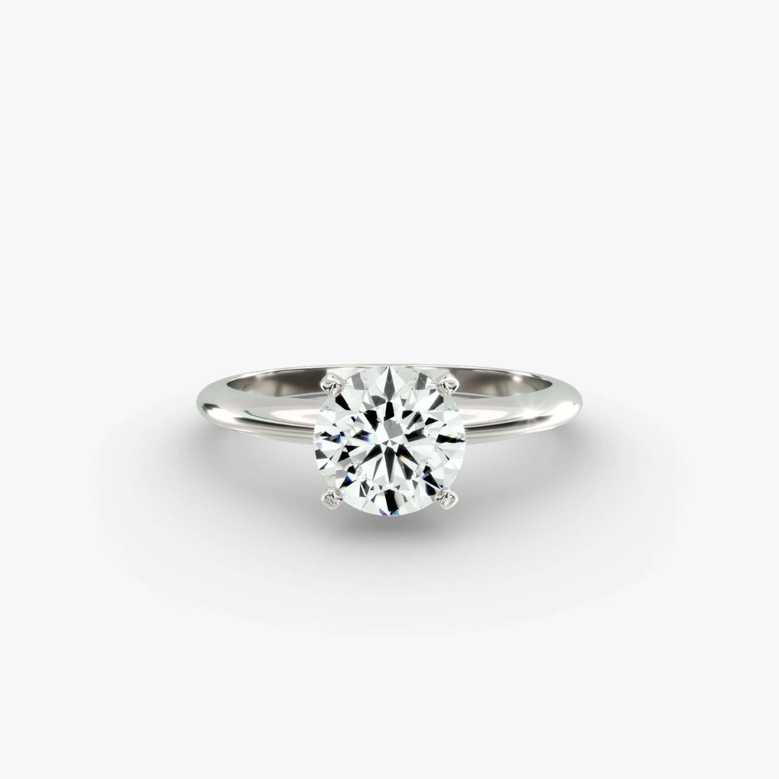Classic Four Prong Solitaire Engagement Ring in Platinum