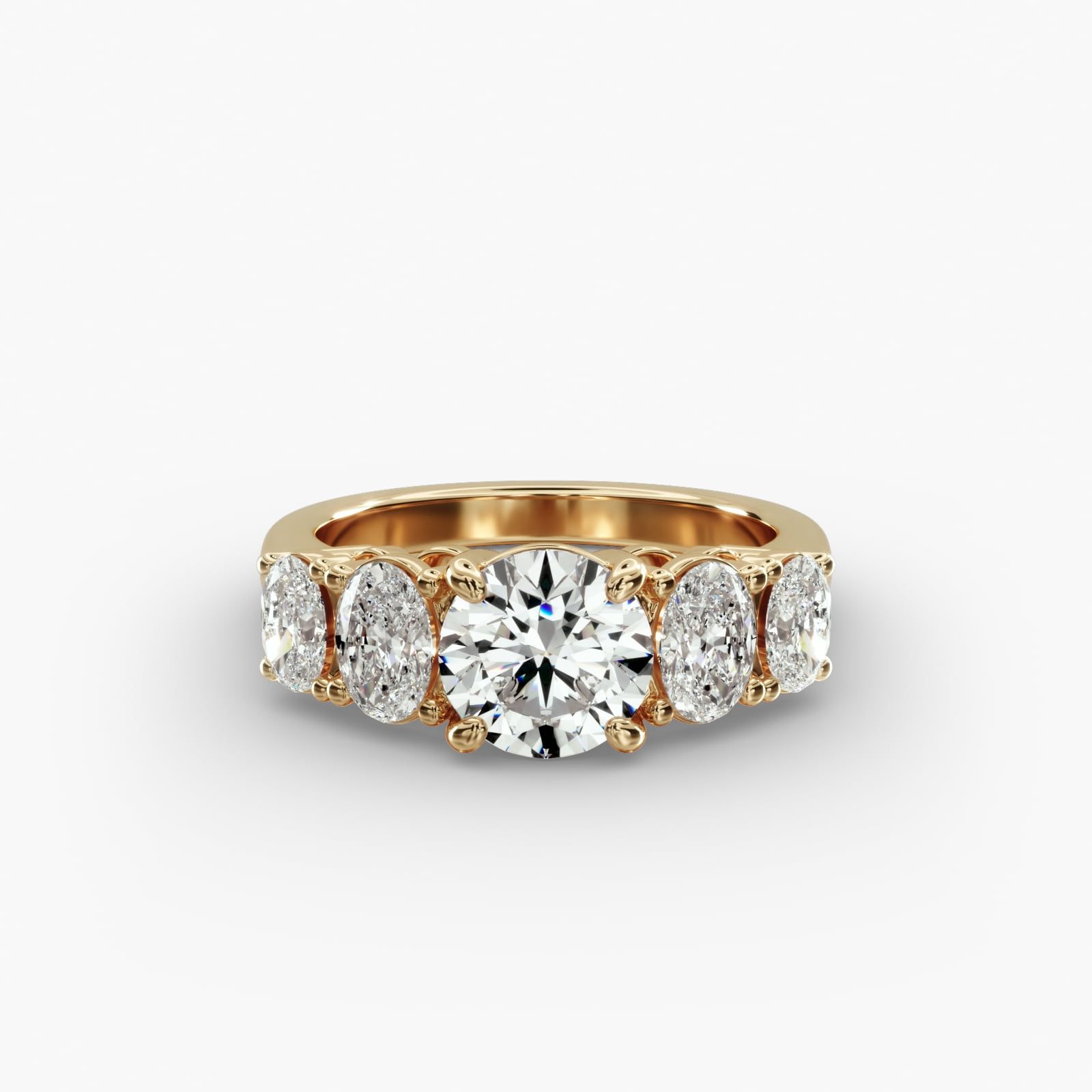 Graduated Oval Diamond Engagement Ring in 14K Yellow Gold (1/2 ct. tw.)