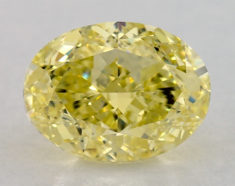 GIA 0.90 Carat Fancy Intense Yellow-VVS2 Oval Cut Diamond